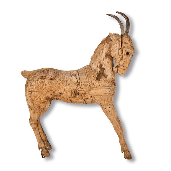 Bonhams : A French carved and stripped juvenile platform ride figure of ...