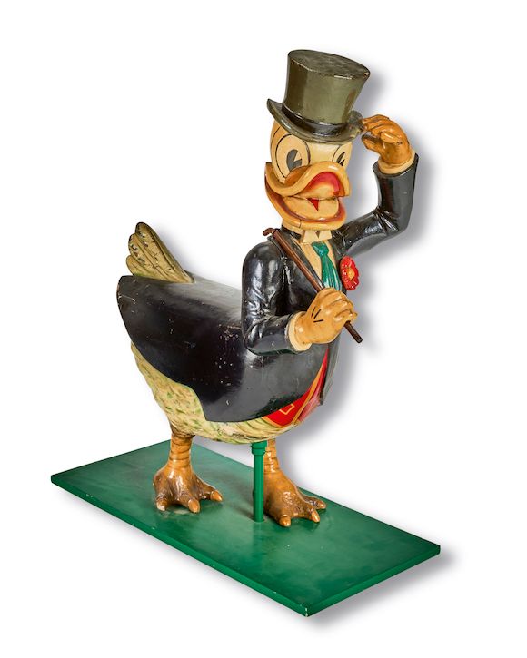 Bonhams : A French carved and painted platform ride figure of Donald ...