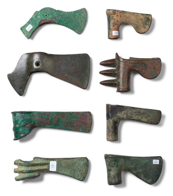 Bonhams : Eight bronze Near Eastern axe heads 8