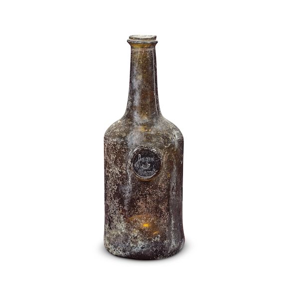 Bonhams : A sealed 'Cylinder' wine bottle, dated 1770