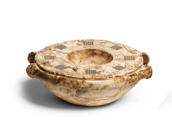 Bonhams : A Syrian limestone dish inlaid with steatite