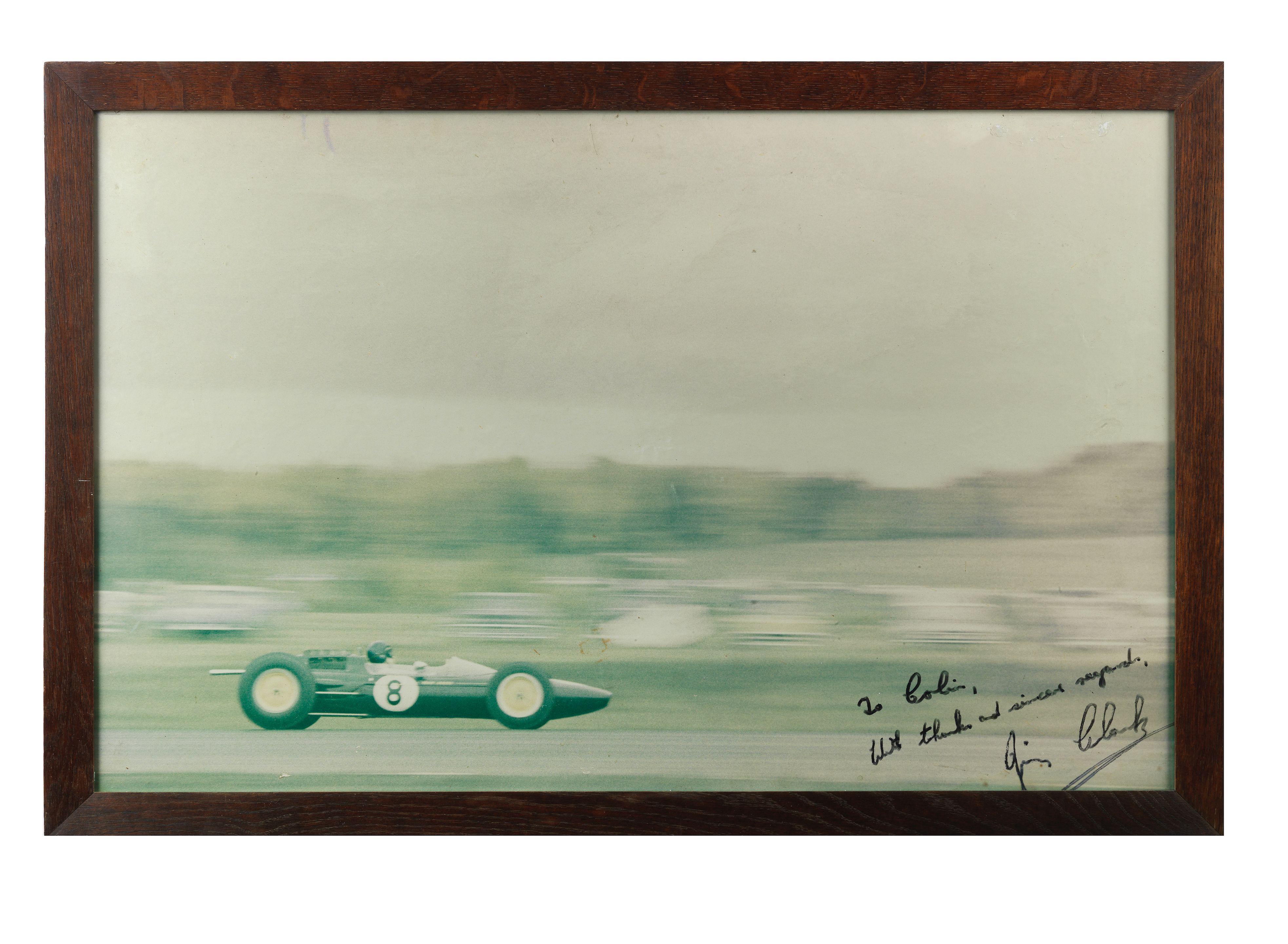 Bonhams Cars : A large image of Jim Clark in his Lotus 25, signed by ...