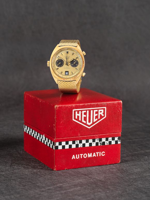 Bonhams : Heuer. A fine and rare 18K gold automatic calendar ...