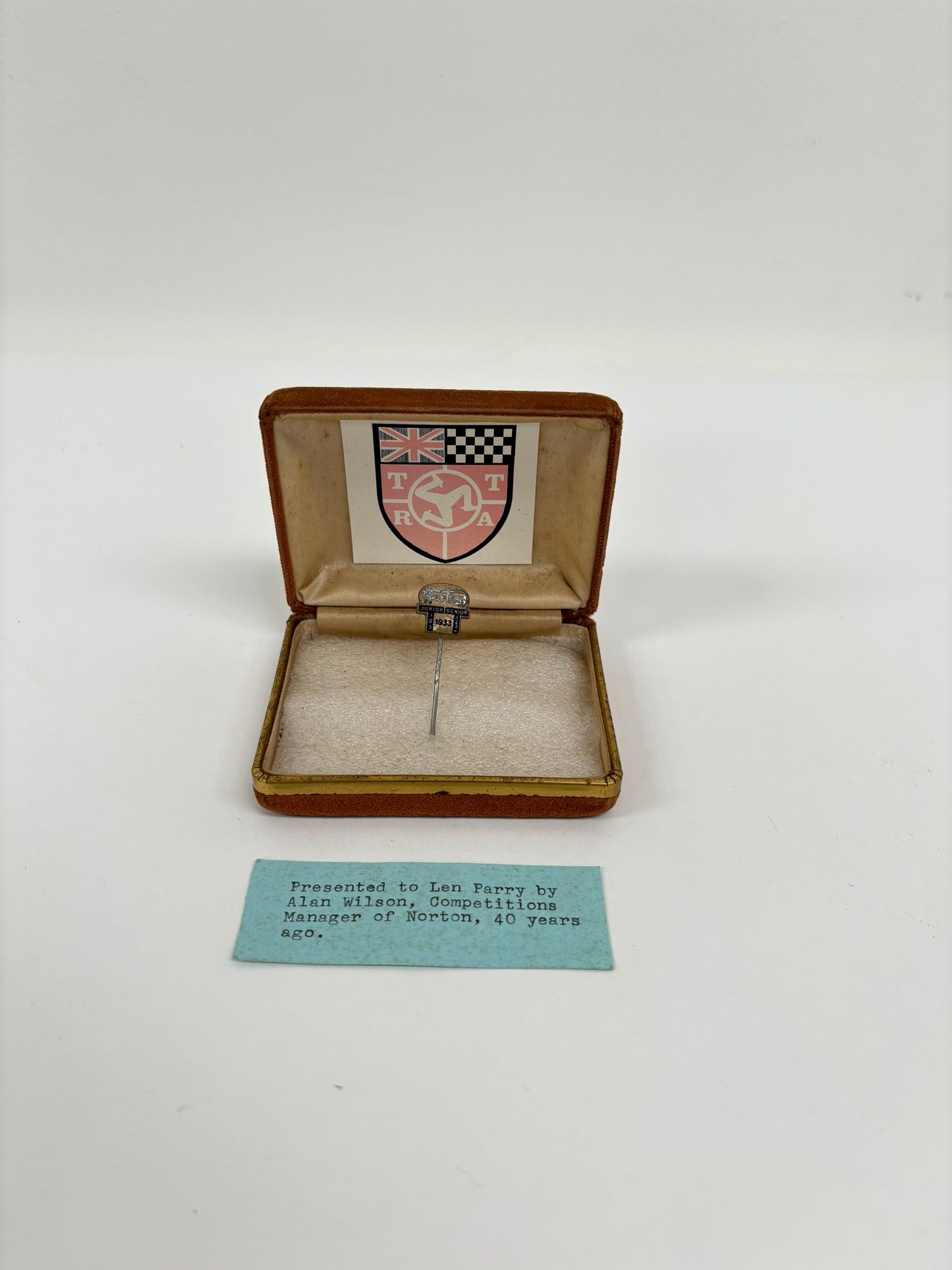 Bonhams Cars : A Norton enamel tie pin commemorating the very first one ...