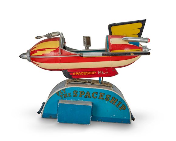 Bonhams : An English coin-operated child's sit-in rocket ship ...