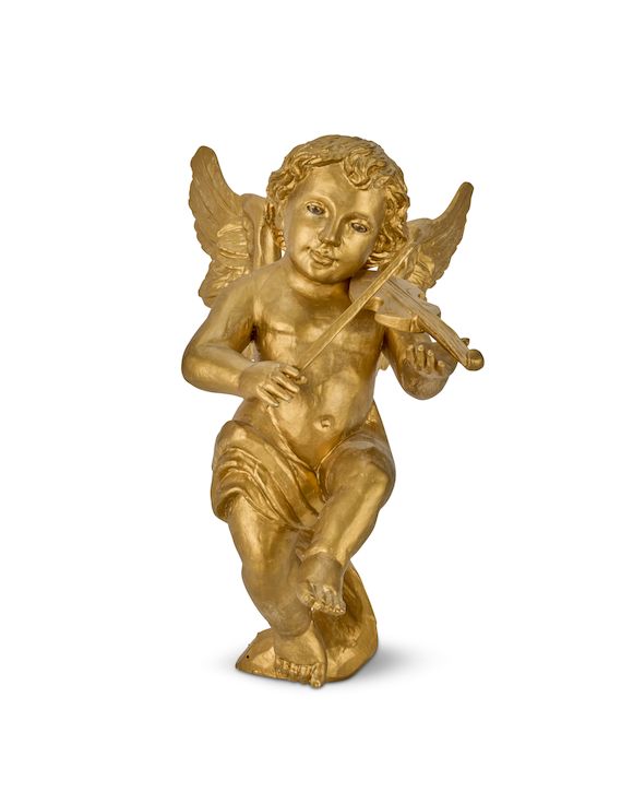 Bonhams : An English carved and later gilded figure of a putti In the ...