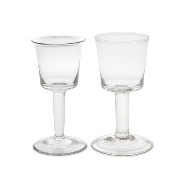 Bonhams : Two plain stem goblets, circa 1740-50