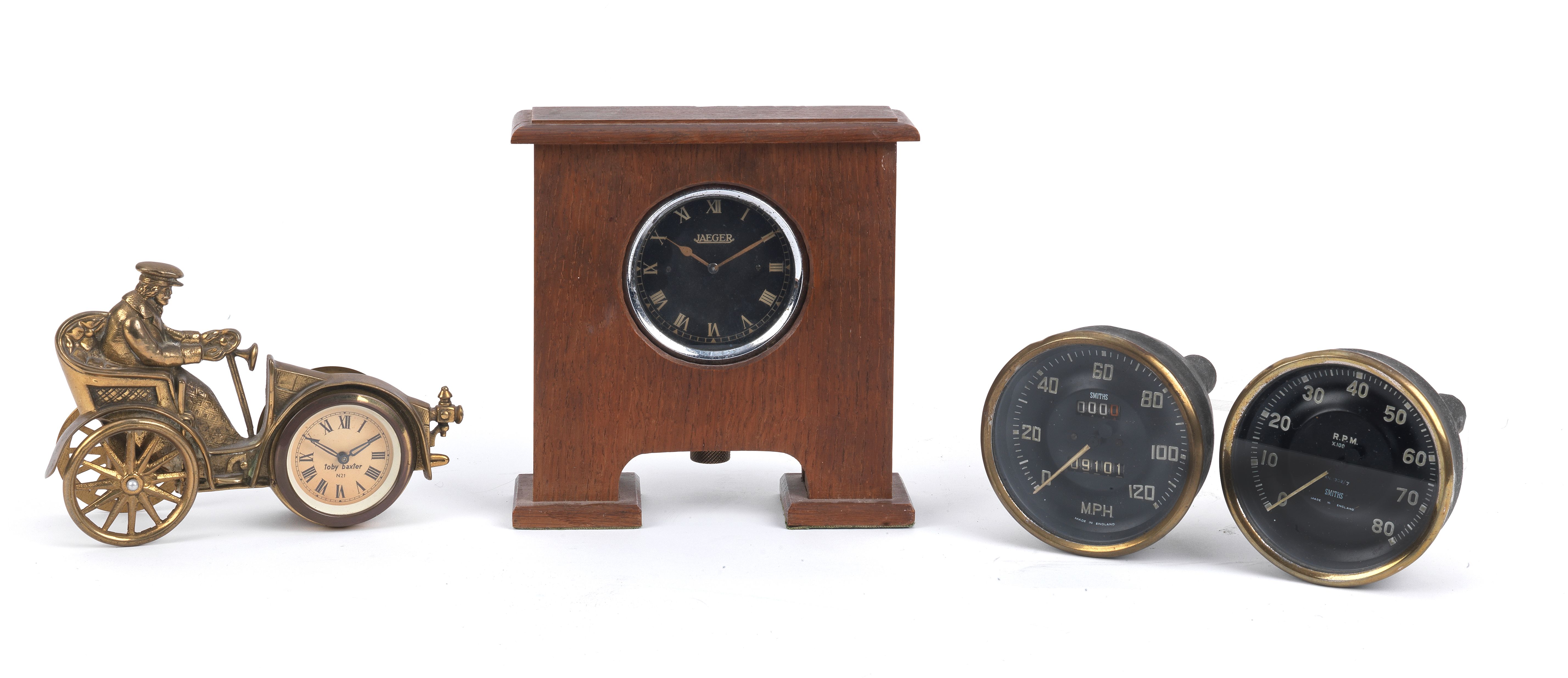 Bonhams Cars : Four assorted clocks and instruments, ((4))