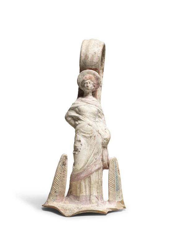 Bonhams : A Canosan polychrome painted pottery oinochoe handle