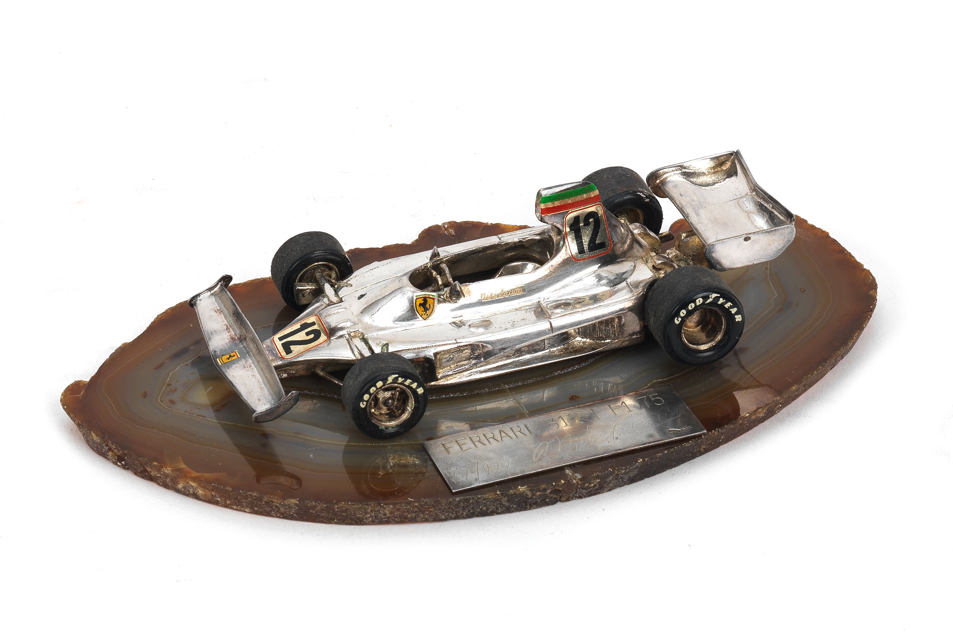 Bonhams Cars : A 1:43 scale solid silver model Niki Lauda's Ferrari ...