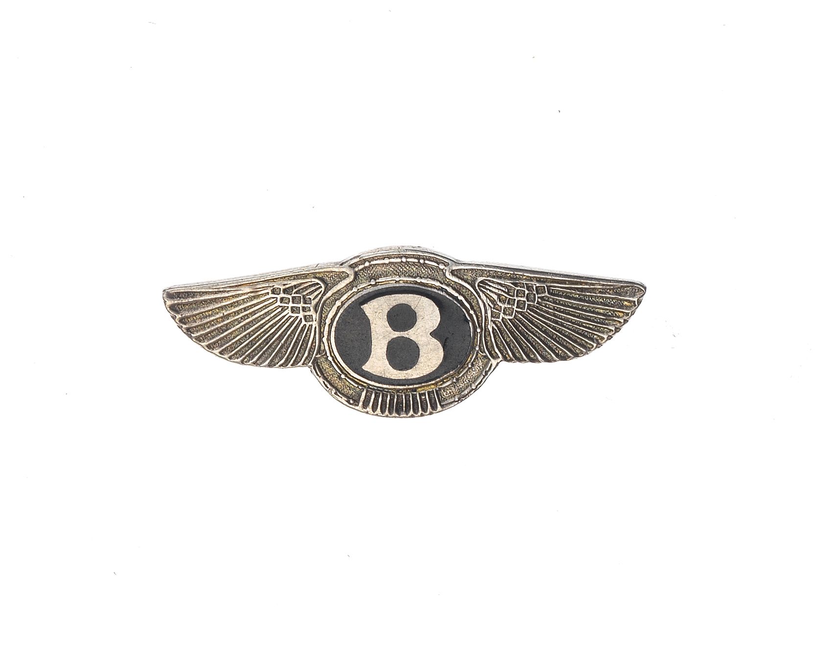 Bonhams Cars : A silver Bentley 'Winged B' lapel badge, 1959,