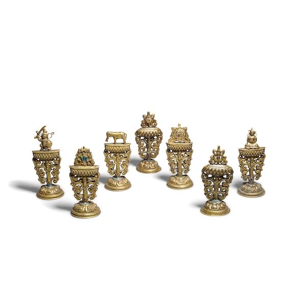 Bonhams : A SET OF SEVEN GILT-COPPER ALLOY PRECIOUS EMBLEMS Tibet or ...