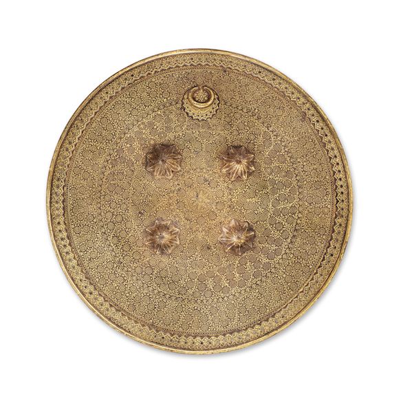 Bonhams : A Sialkhot gold-koftgari steel shield (dhal) North India ...