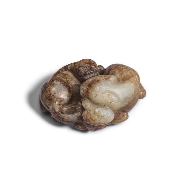 Bonhams : A DARK GREY AND CREAM JADE 'TWIN CATS' CARVING Ming dynasty