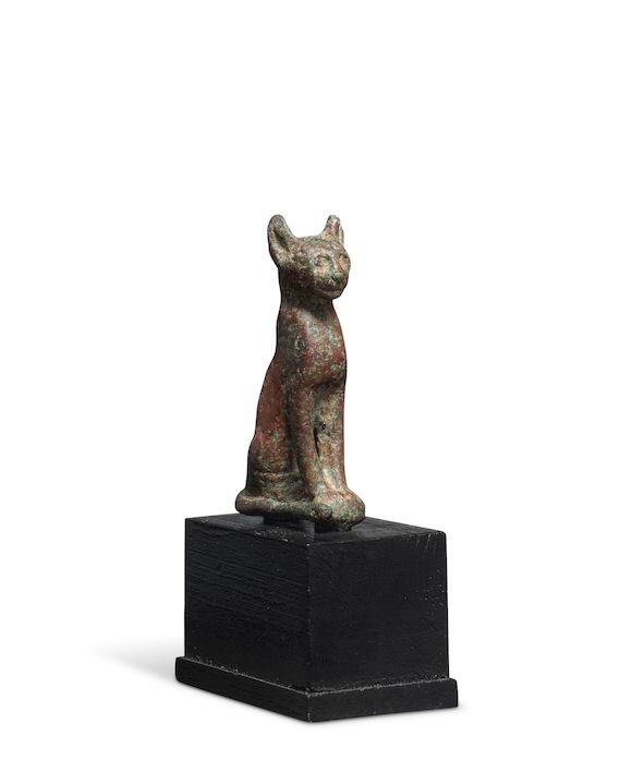 Bonhams : An Egyptian bronze seated cat