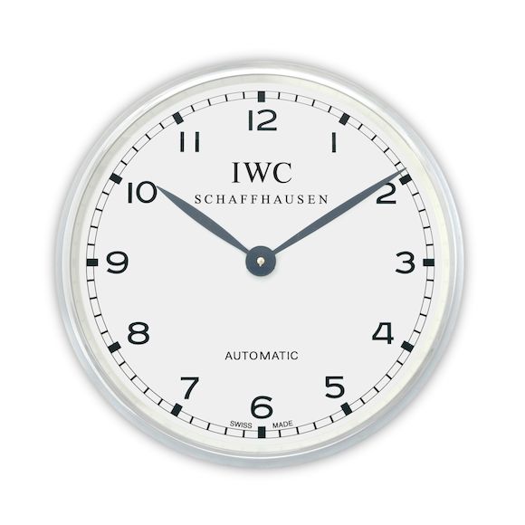 Bonhams : IWC. A plastic and stainless steel wall clock Circa 2010