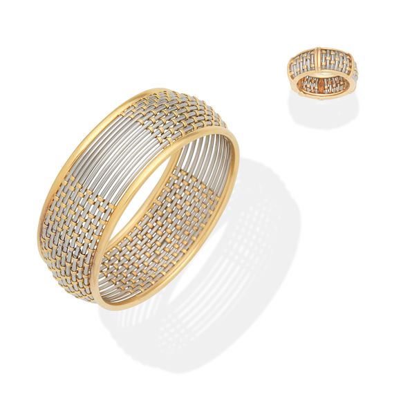 Bonhams : CARTIER: 'VISION' BANGLE AND RING SUITE (2)