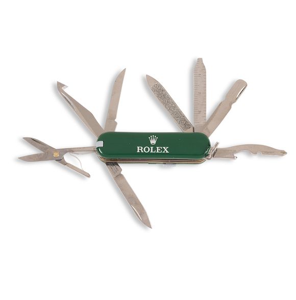 Bonhams Cornette de Saint Cyr : Rolex. A green pocket knife Rolex ...
