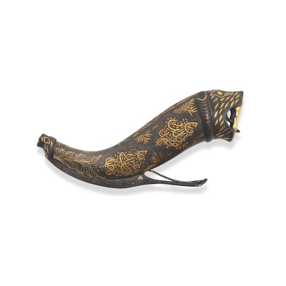 Bonhams : An Indian gold damascened bronze powder flask