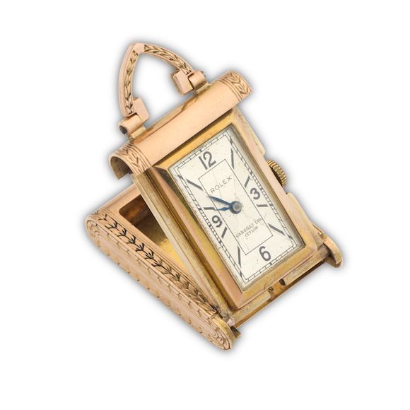 Bonhams : Rolex. A 9K gold manual wind purse watch Retailed by Cargills ...
