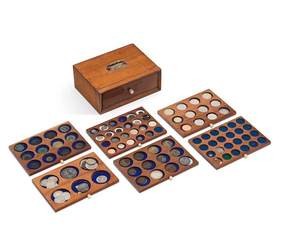 Bonhams : A mahogany coin cabinet with six stackable draws, housing an ...