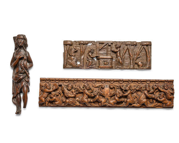Bonhams : A 16th century carved oak figural frieze panel depicting two figures by a well ...