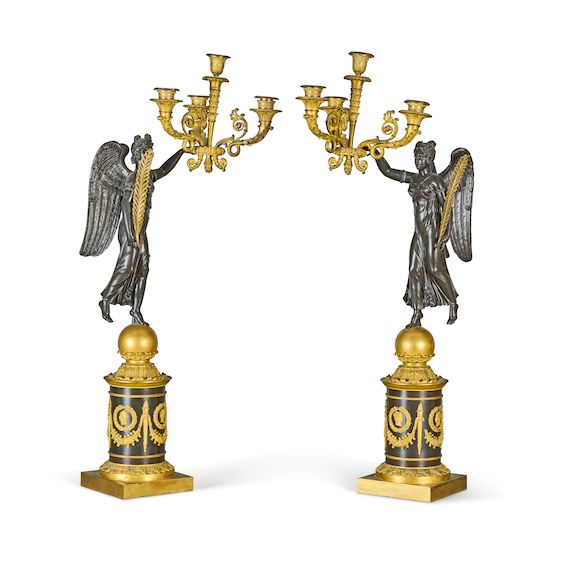 Bonhams : A pair of French patinated and gilt bronze four-light ...