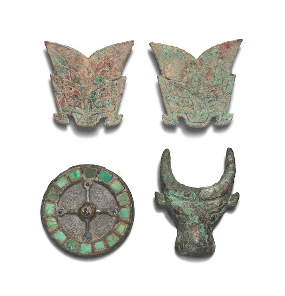 Bonhams : THREE BRONZE ANIMAL-HEAD MASKS AND A TURQUOISE AND LAPIS ...