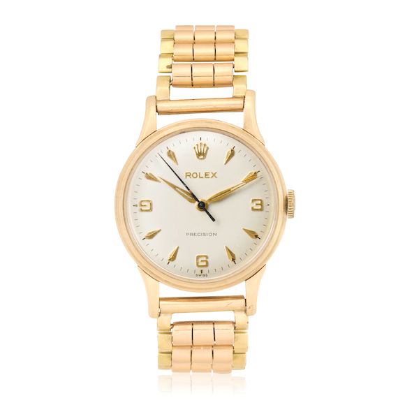 Bonhams : Rolex. A 9K gold manual wind wristwatch with associated gold ...