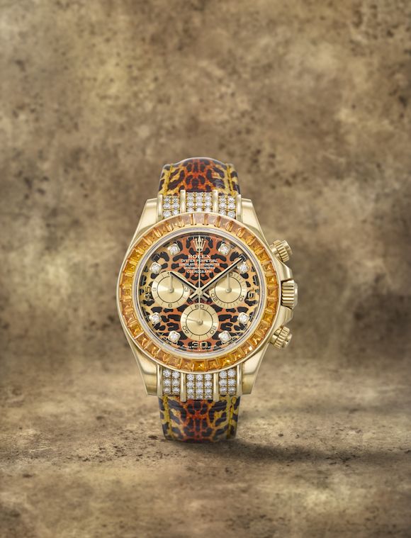 Bonhams : Rolex. A fine and rare 18K gold diamond and yellow sapphire ...