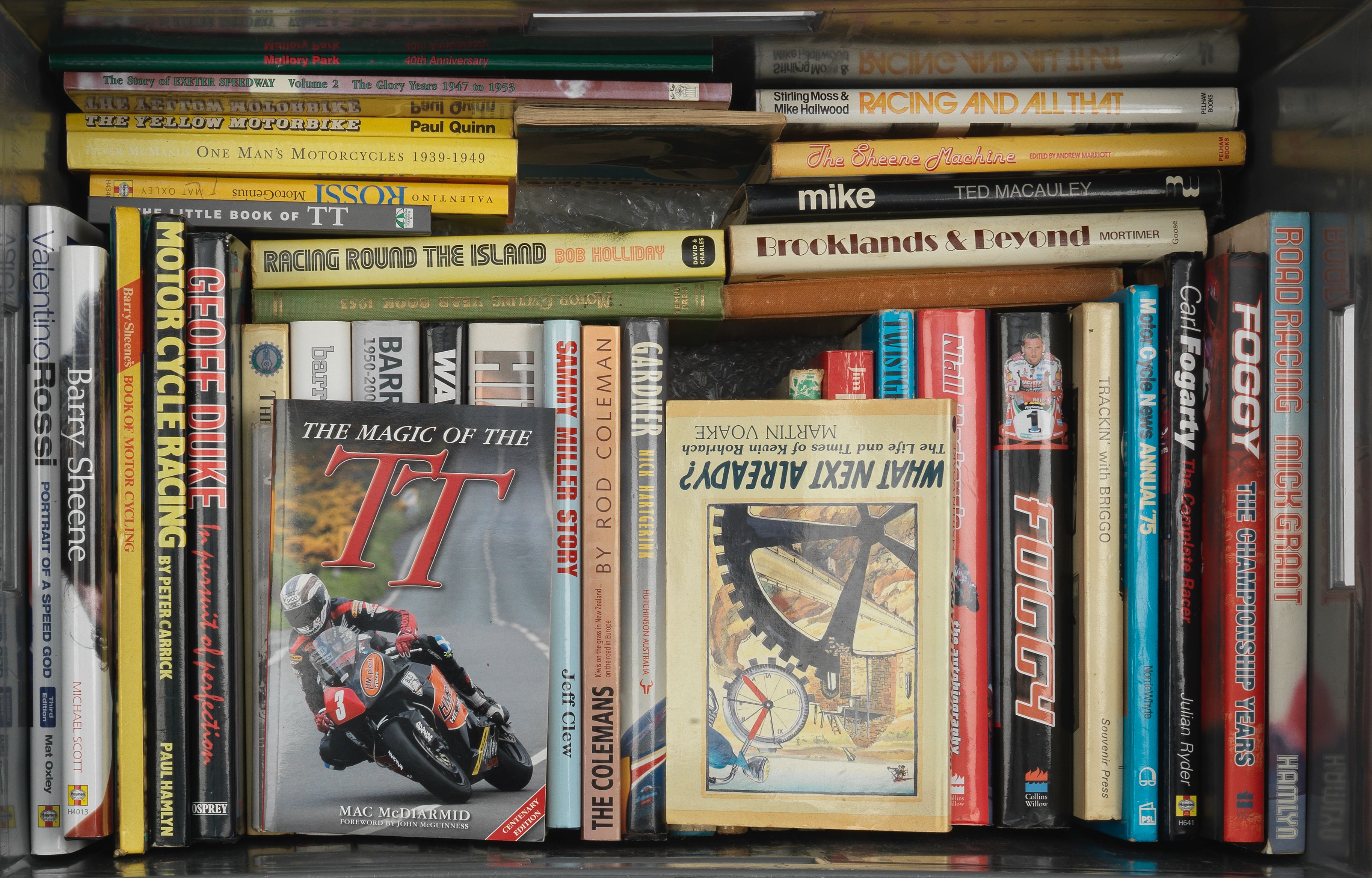 Bonhams Cars : Motorcycle racing books signed by riders, ((Qty))