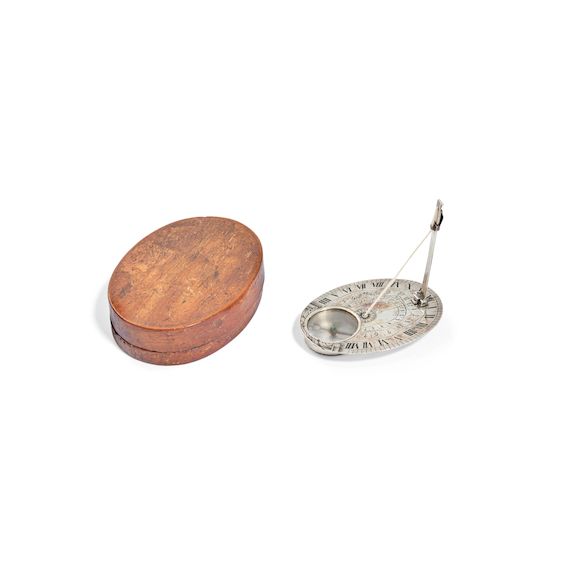 Bonhams : An unusual oval silver string gnomon compass dial, French ...