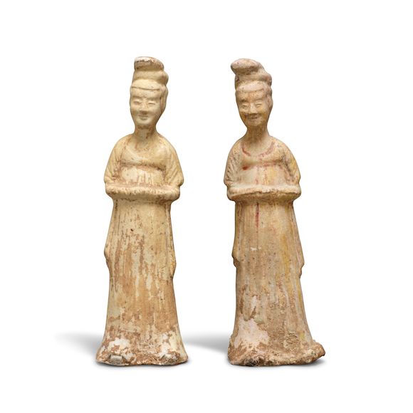 Bonhams : A PAIR OF STRAW-GLAZED POTTERY FIGURES OF COURT LADIES Sui ...