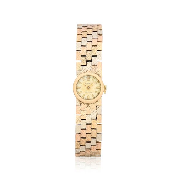 Bonhams : Rolex. A lady's three colour 9K gold manual wind bracelet ...