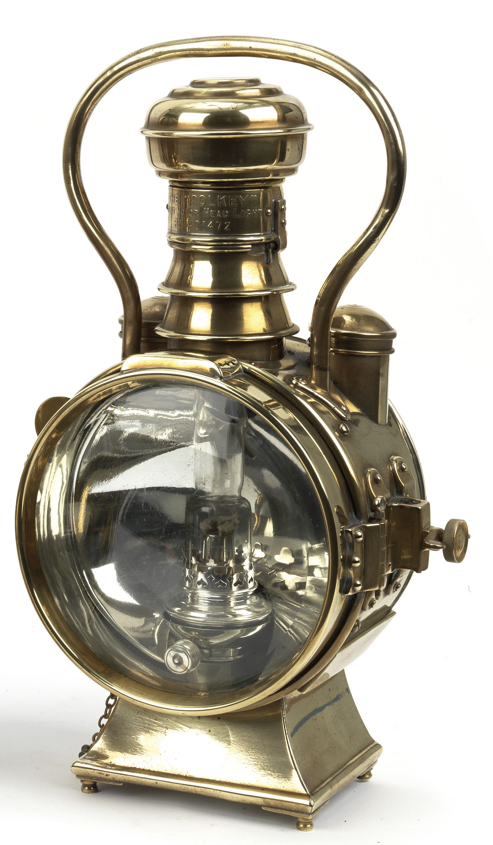 Bonhams Cars : A 'The Polkey' oil illuminating car headlamp, circa 1900,