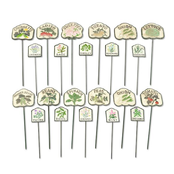 Bonhams : A collection of cast iron hand painted food markers