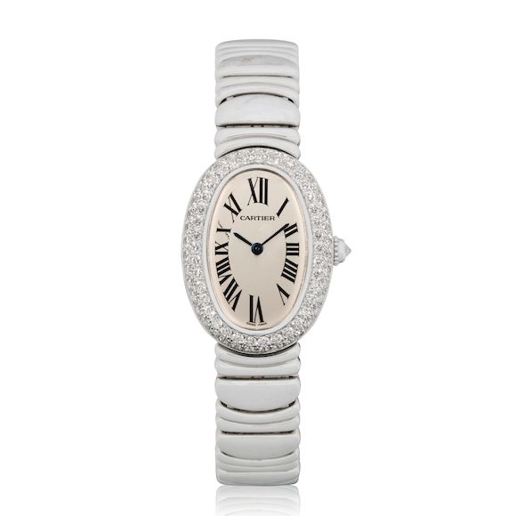 Bonhams : Cartier. A lady's 18K white gold diamond set quartz bracelet ...