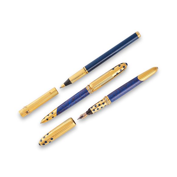 Bonhams Cornette de Saint Cyr : Cartier. Set of 2 gilt metal and blue ...
