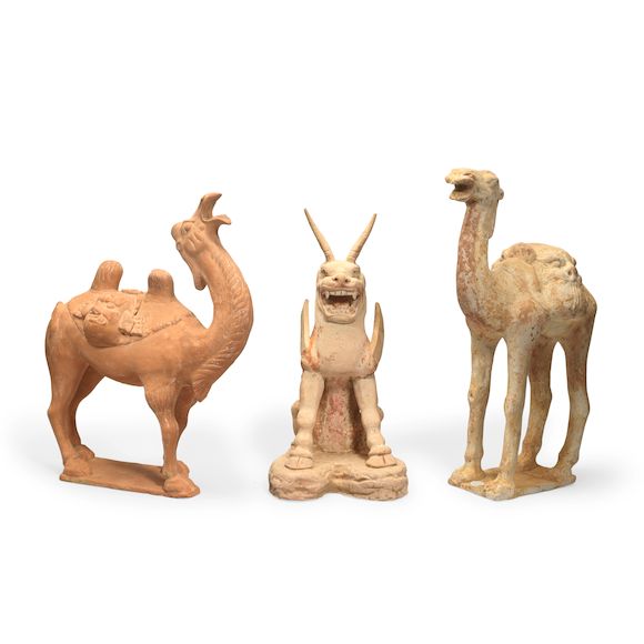 Bonhams : TWO TERRACOTTA MODELS OF CAPARISONED CAMELS AND A TERRACOTTA ...